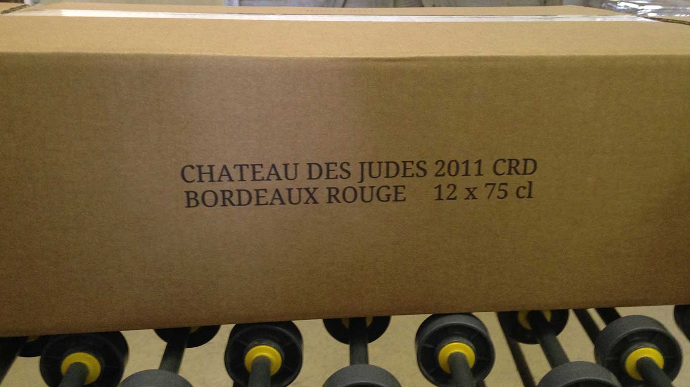 Coder les bouteilles et imprimer les cartons